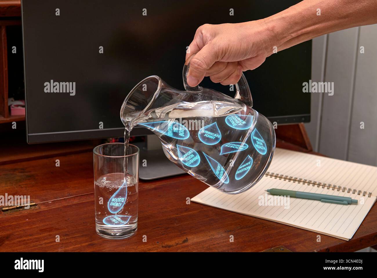 Person pouring water infused hi-res stock photography and images - Alamy