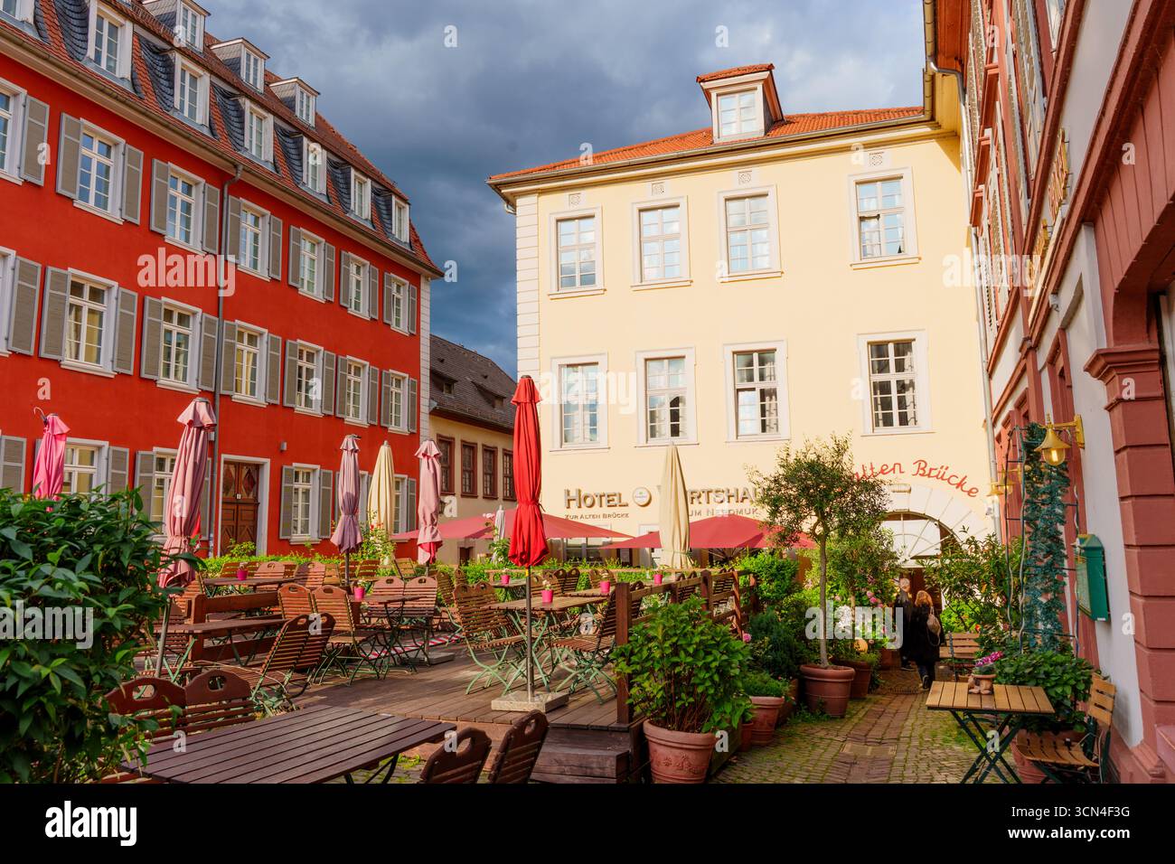 Heidelberg, Germany - June 8, 2025: Cozy outdoor cafe scene in ...