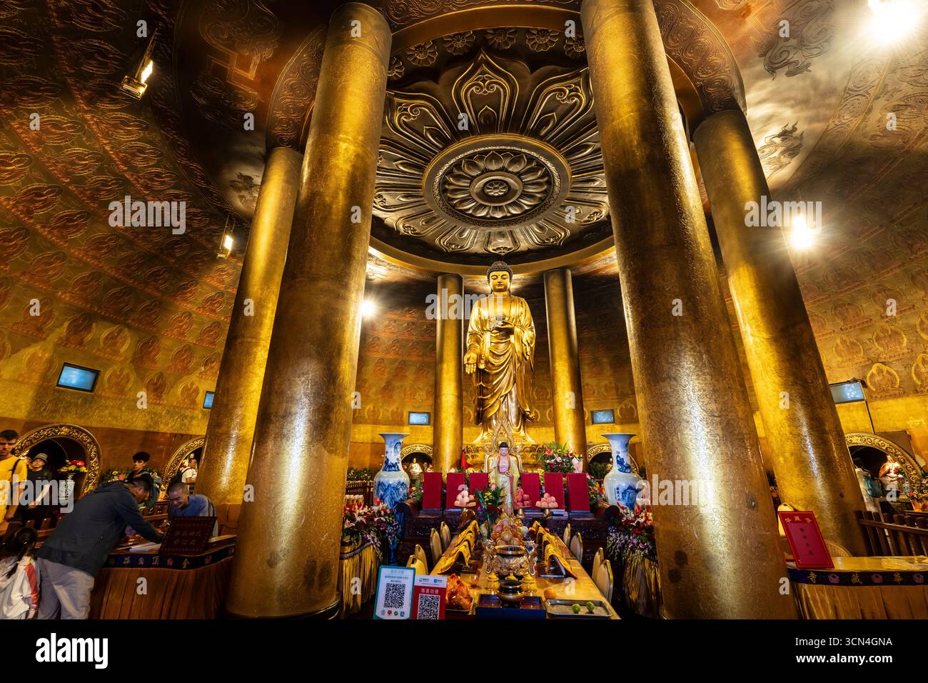 inner temple, circular hall with golden Buddha, Golden Summit, Emeishan ...