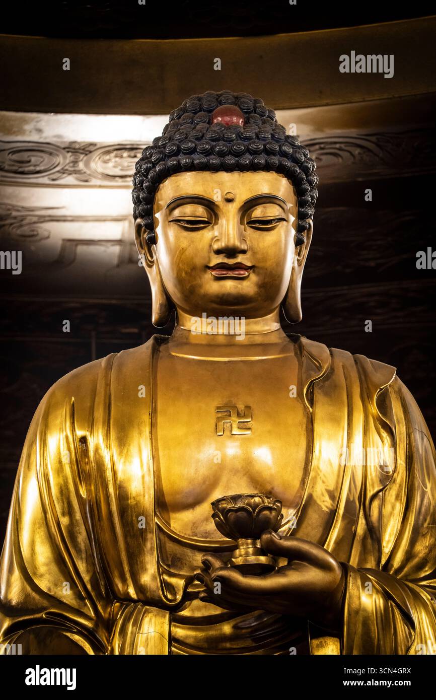 inner temple with golden Buddha, Golden Summit, Emeishan, Leshan ...