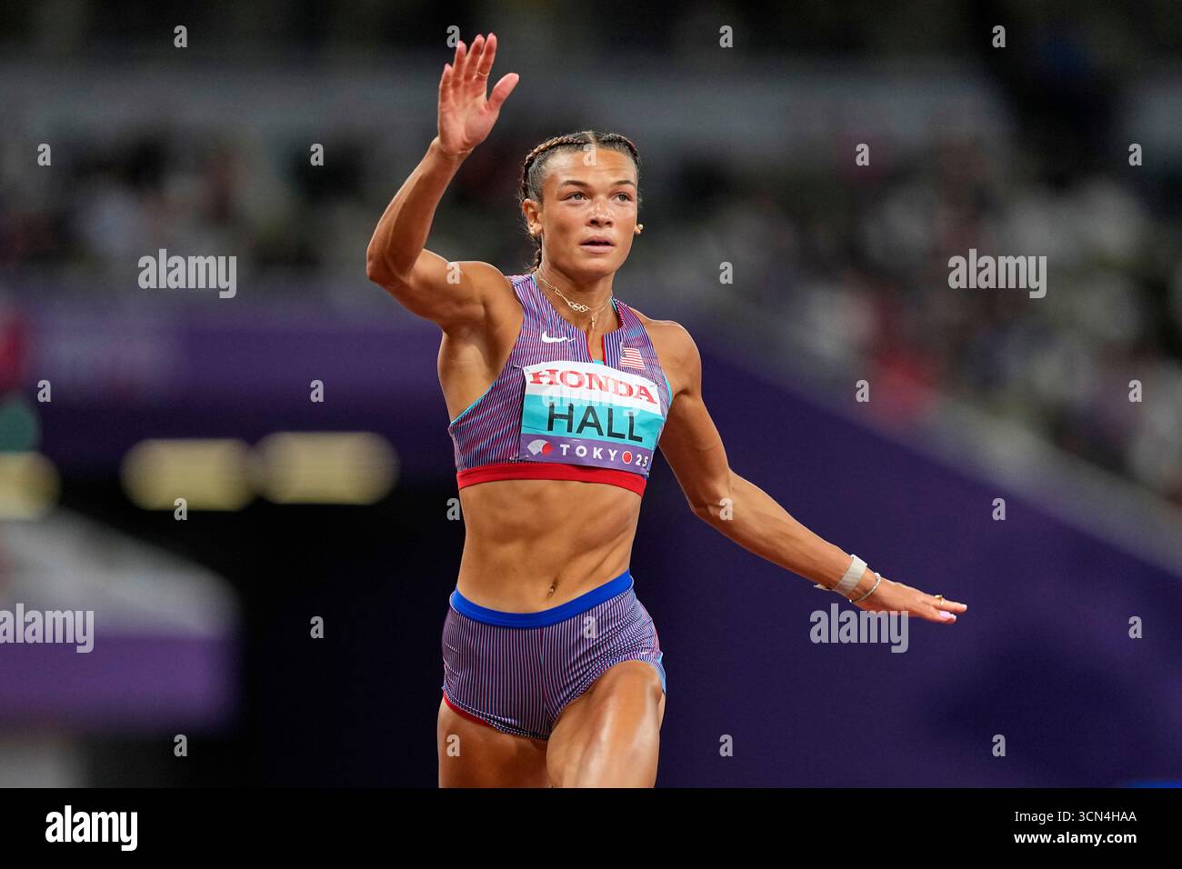 United States' Anna Hall reacts as she finishes in the heptathlon 100 ...