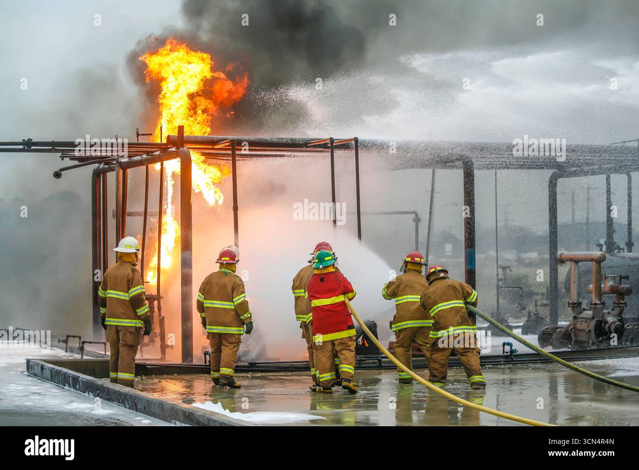 Firefighters practice in a refinery Stock Photo - Alamy