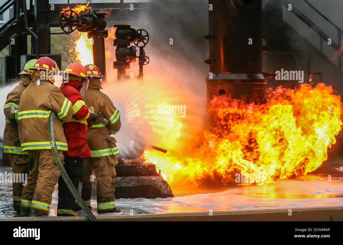 Firefighters practice in a refinery Stock Photo - Alamy
