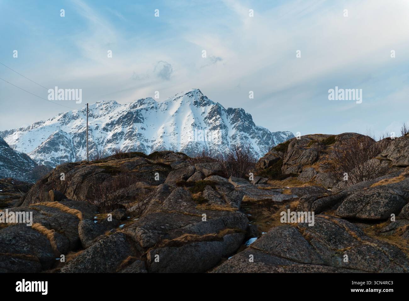 Snow-Capped Mountain with Rocky Foreground Stock Photo - Alamy