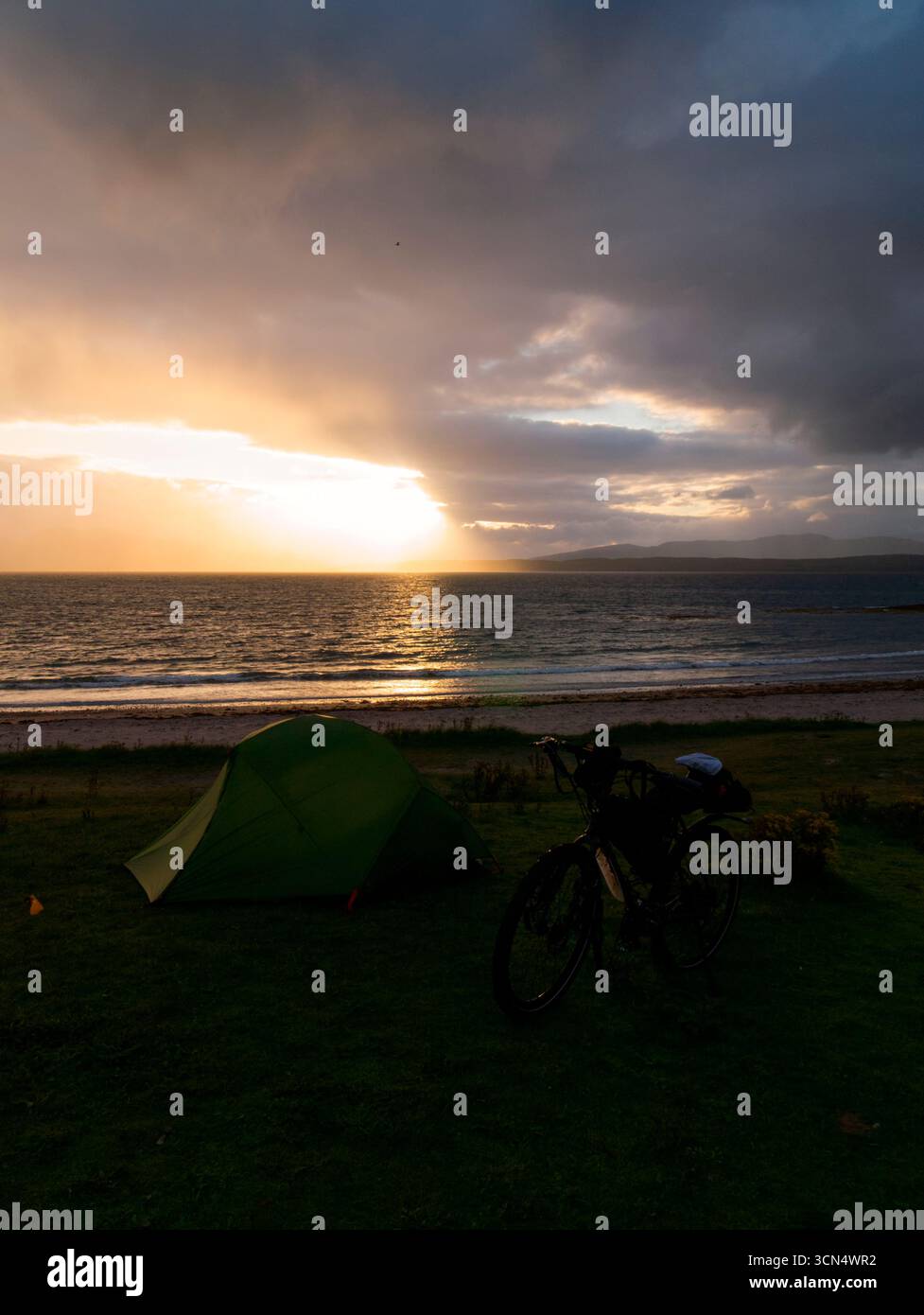 Wild camping at Ganavan beach, Oban, Argyll Stock Photo - Alamy