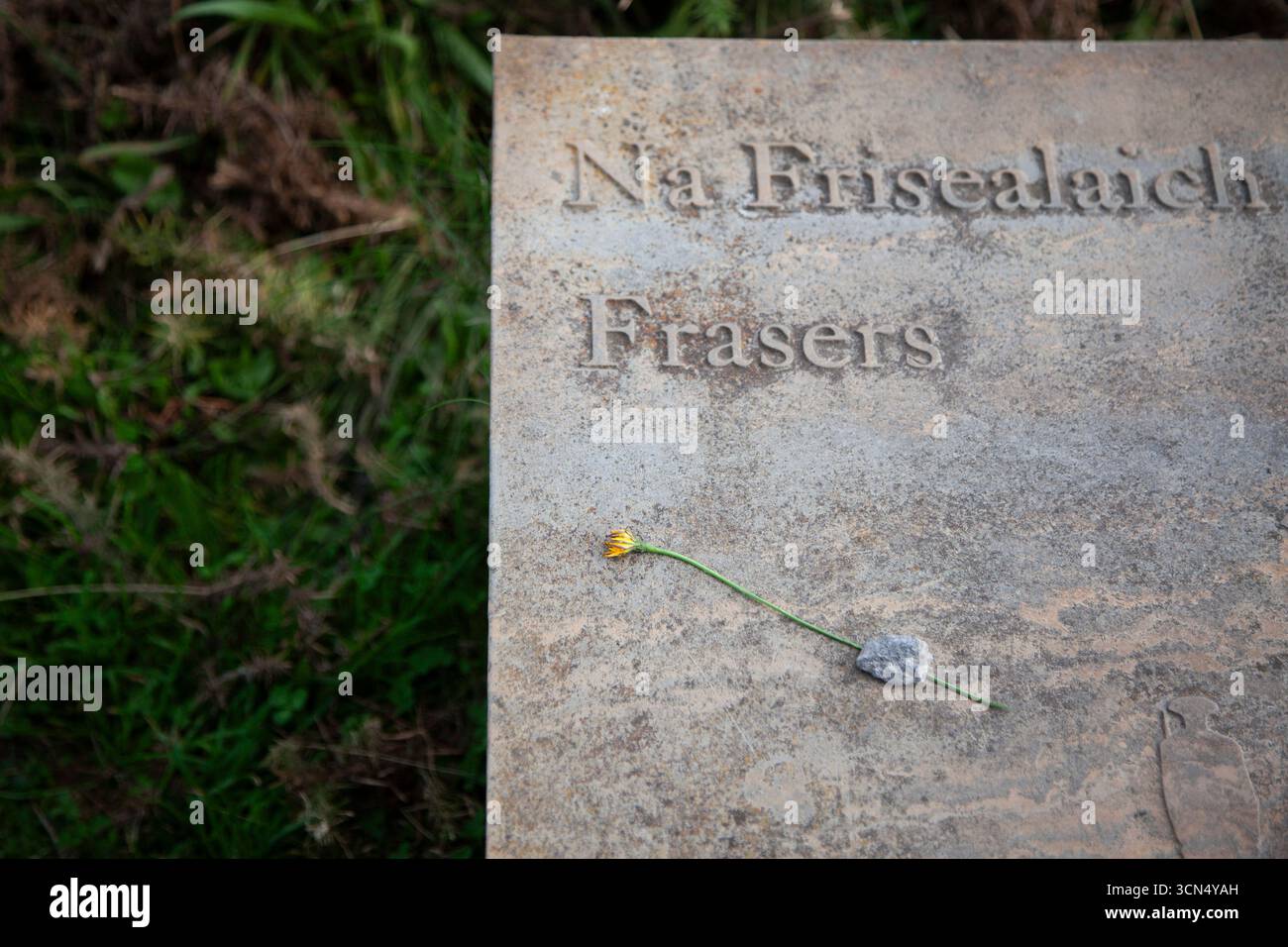 A memorial stone in memory of the Fraser Clan. Scotland, Highland ...