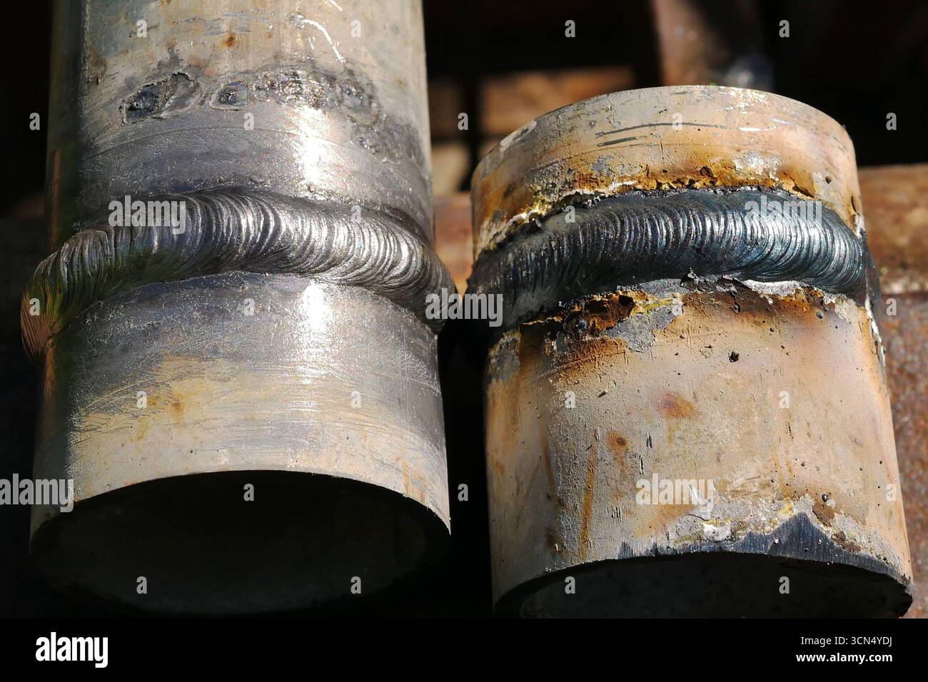 Metal pipe with welded seam. Welding of pipes Stock Photo - Alamy