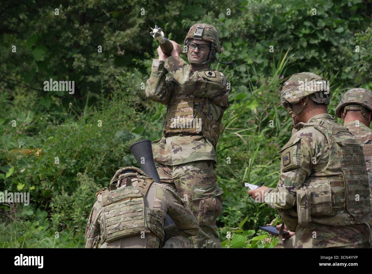 The U.S. Army soldiers prepare to fire 81mm mortar during a joint ...