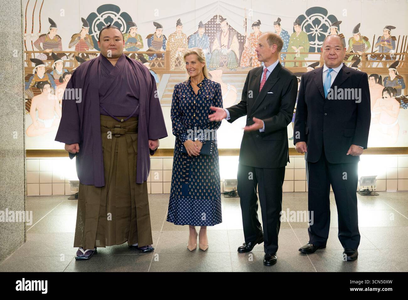 The Duke and Duchess of Edinburgh meet wrestler Asanoyama Hiroki (left) before attending the ...