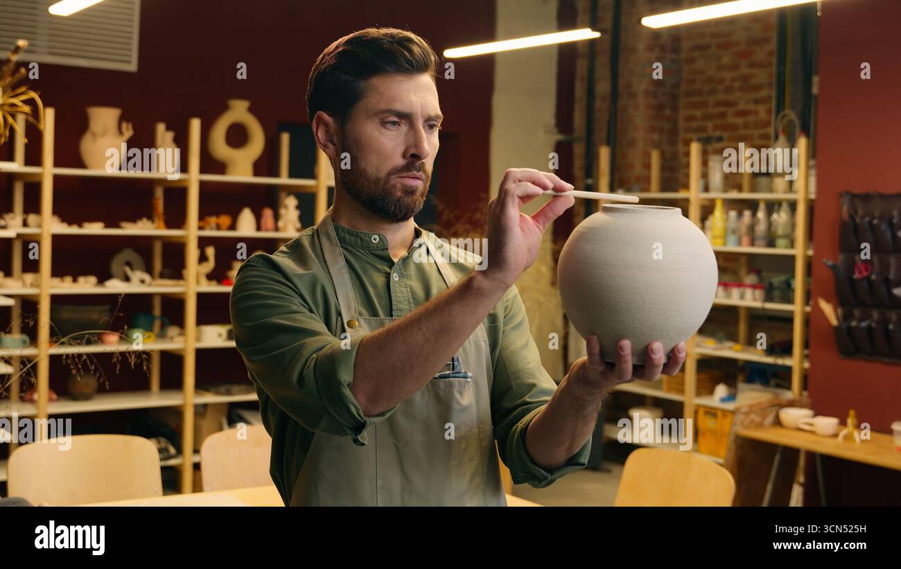 Careful thoughtful skilled Caucasian guy man small business owner ...