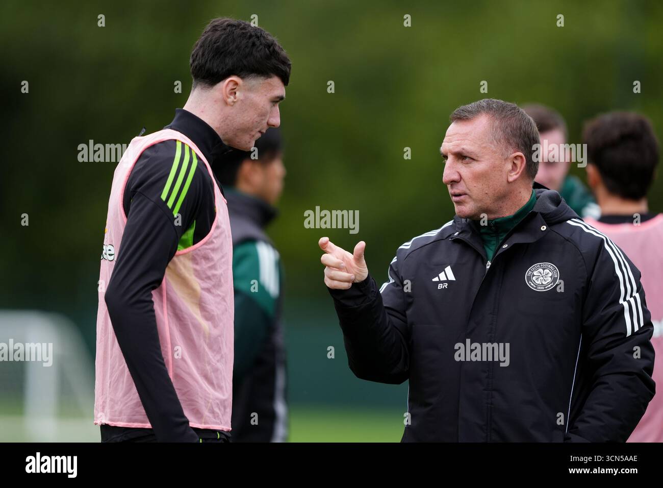 Celtic manager Brendan Rodgers and Colby Donovan during a training ...