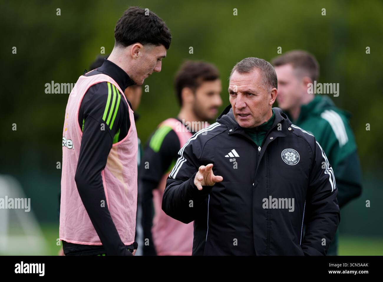 Celtic manager Brendan Rodgers and Colby Donovan during a training ...