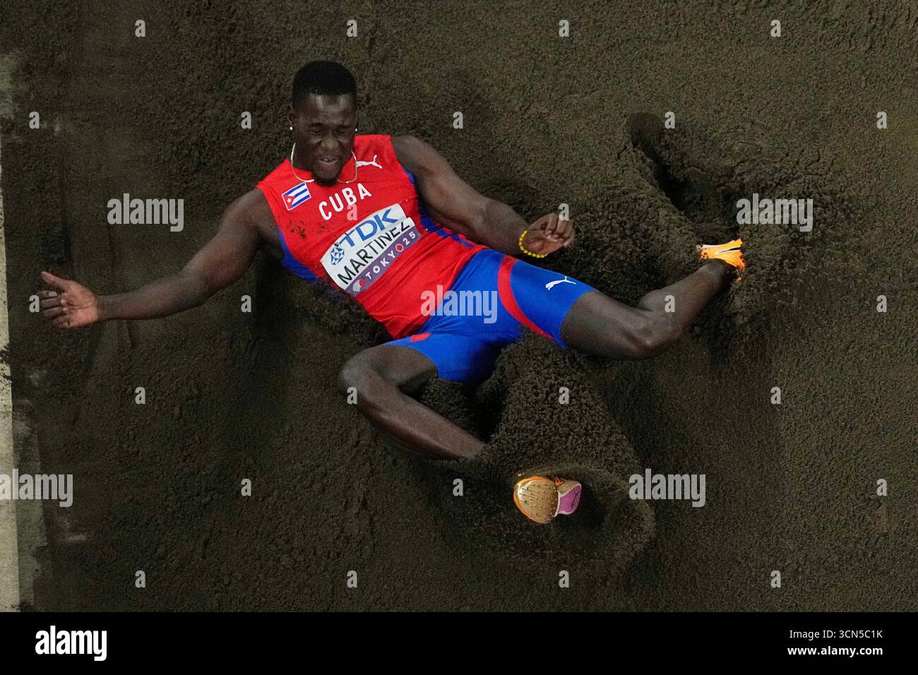 Cuba's Lazaro Martinez competes in the men's triple jump final at the ...