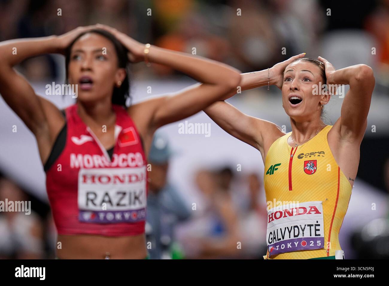 Lithuania's Gabija Galvydyte, right, and Morocco's Assia Raziki react ...