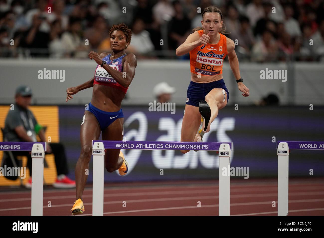 Netherlands' Femke Bol, right, gold medalist competes in the men's 400 ...