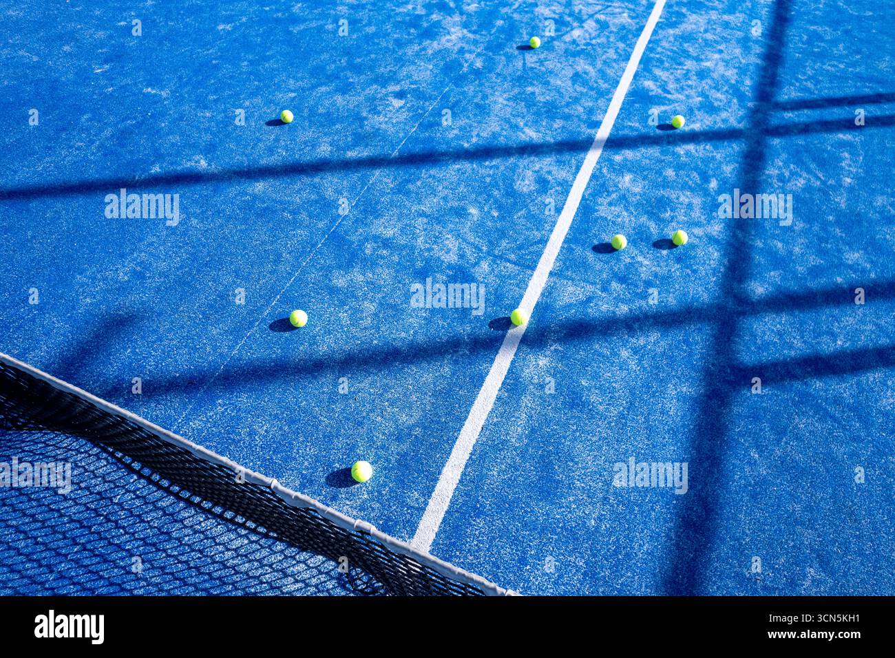 High angle shot of a sunny tennis court with geometric patterns Stock ...