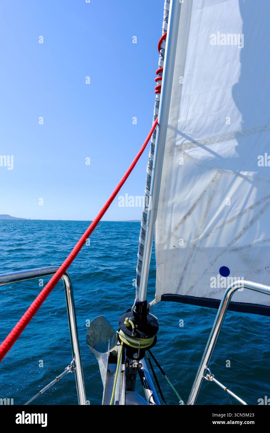 25 AUG 2025 - Dorset, UK - Sailing on a modern monohul sailing yacht on ...