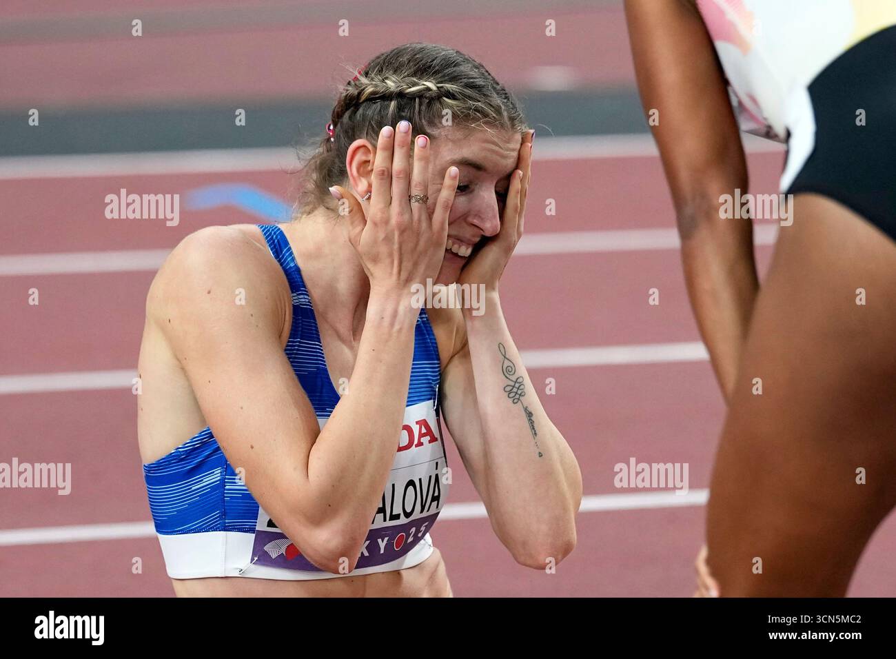 Slovakia's Emma Zapletalova reacts after winning the bronze medal in ...