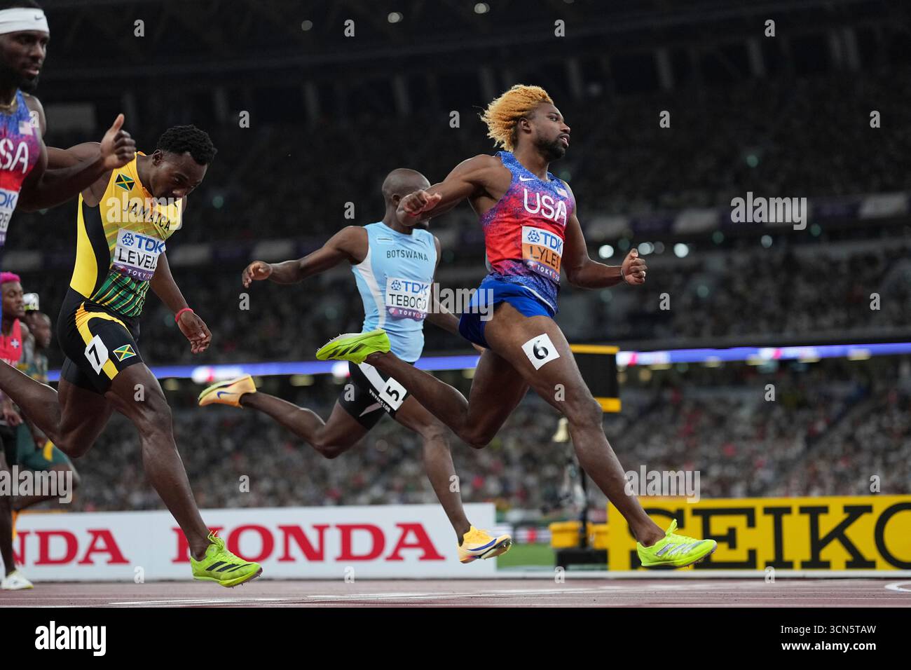 United States' Noah Lyles, right, wins the men's 200 meters final at ...