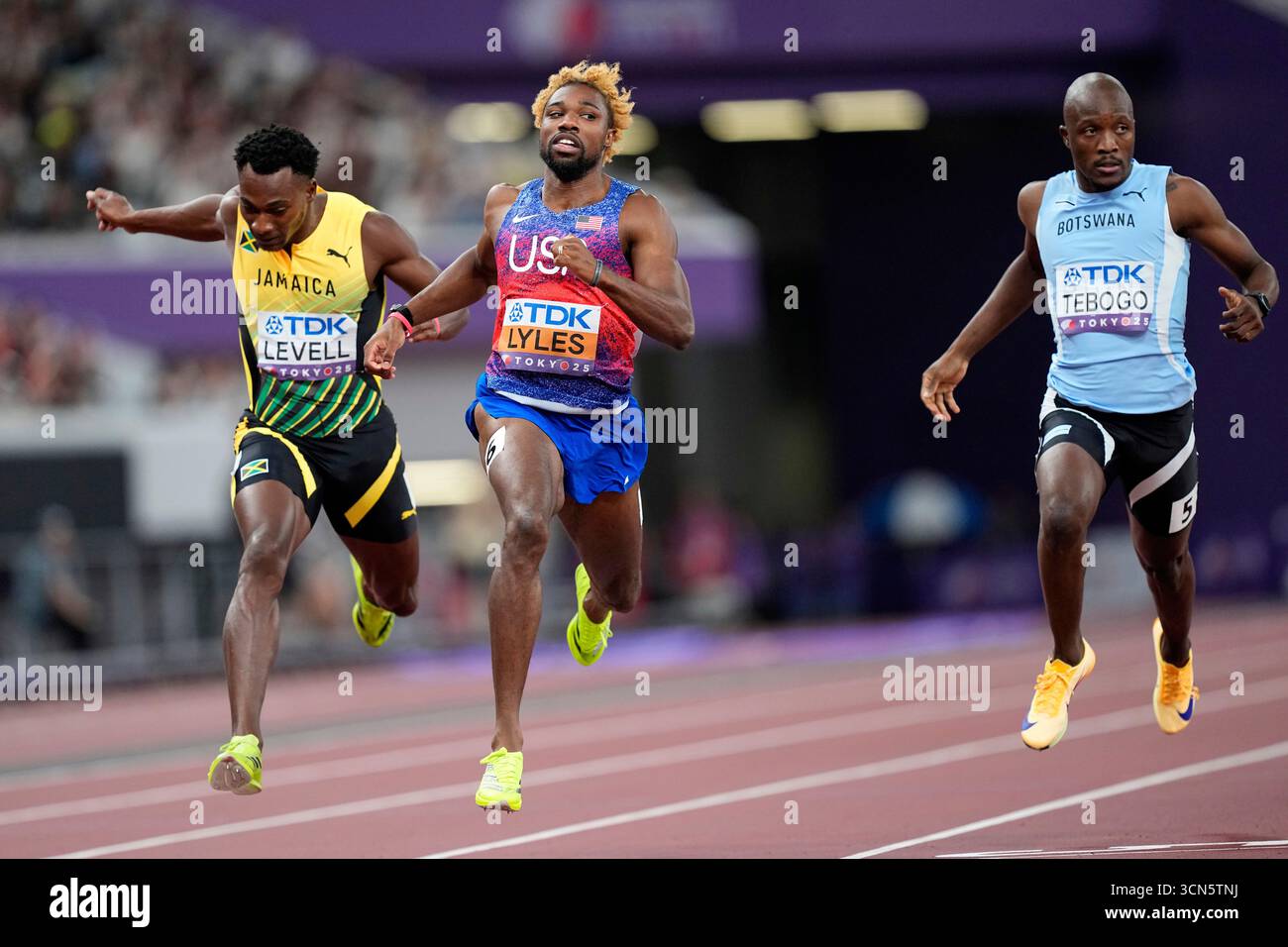 United States' Noah Lyles crosses the line to win gold ahead of Jamaica ...