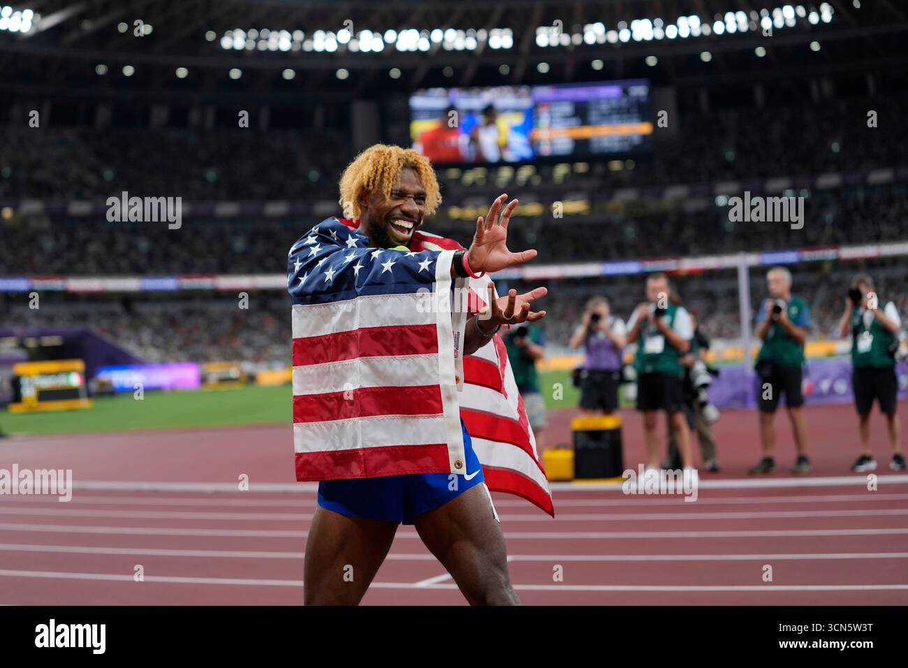 United States' Noah Lyles celebrates after winning gold medal in the ...
