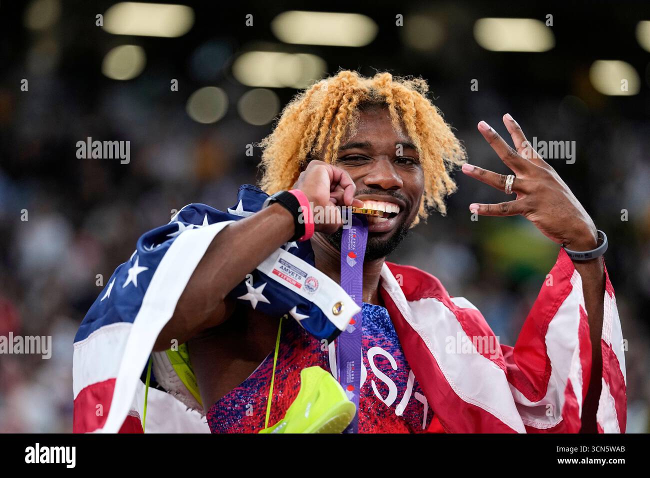 United States' Noah Lyles poses after winning the gold medal in the men ...