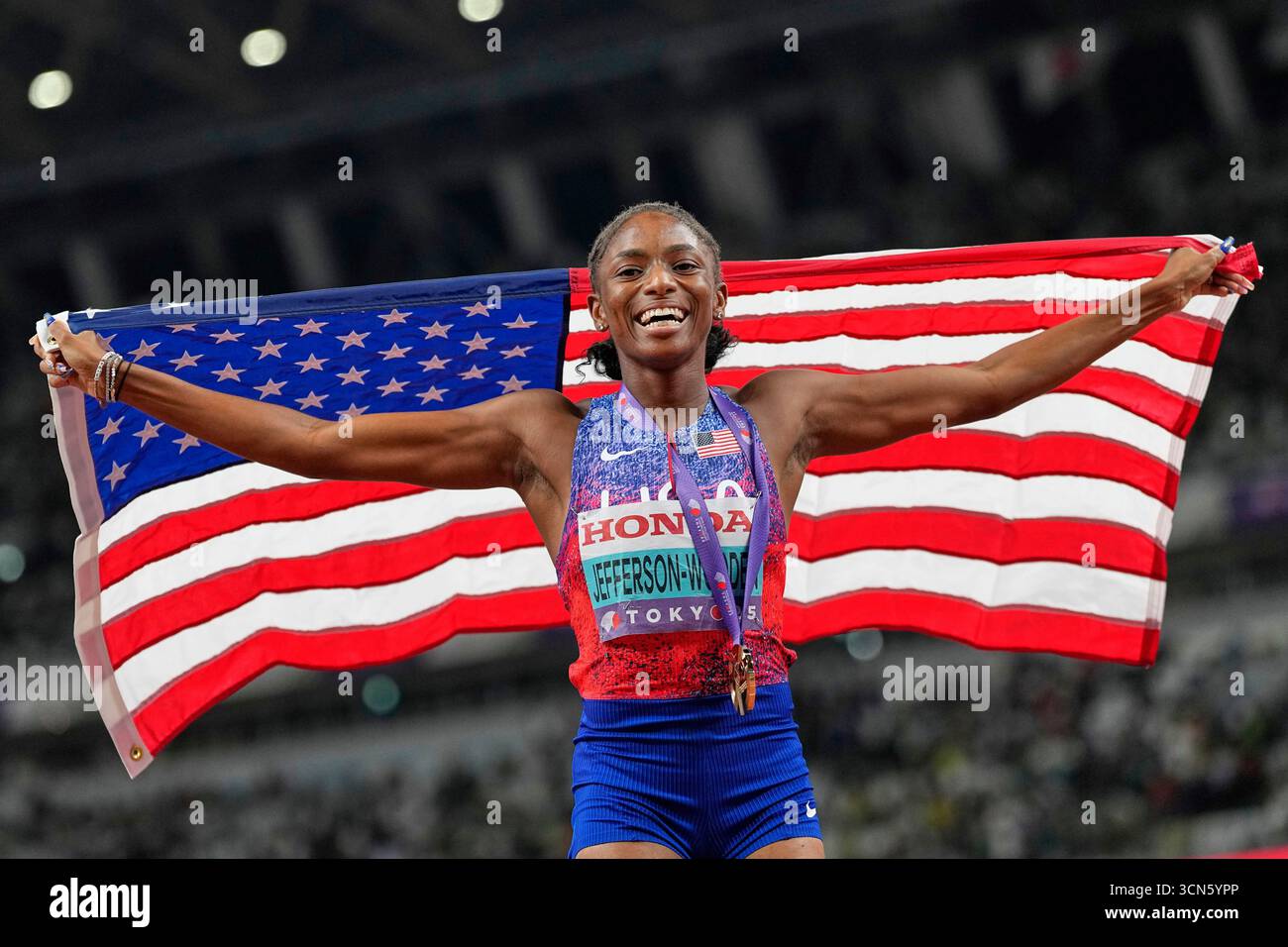 United States' Melissa Jefferson-Wooden celebrates after she won the ...