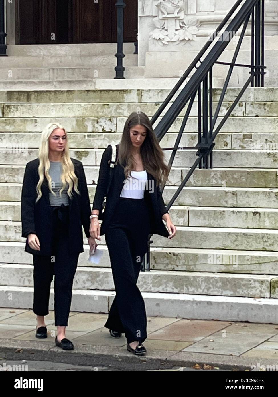 Former prison worker Megan Breen (left) leaves Cardiff Crown Court ...