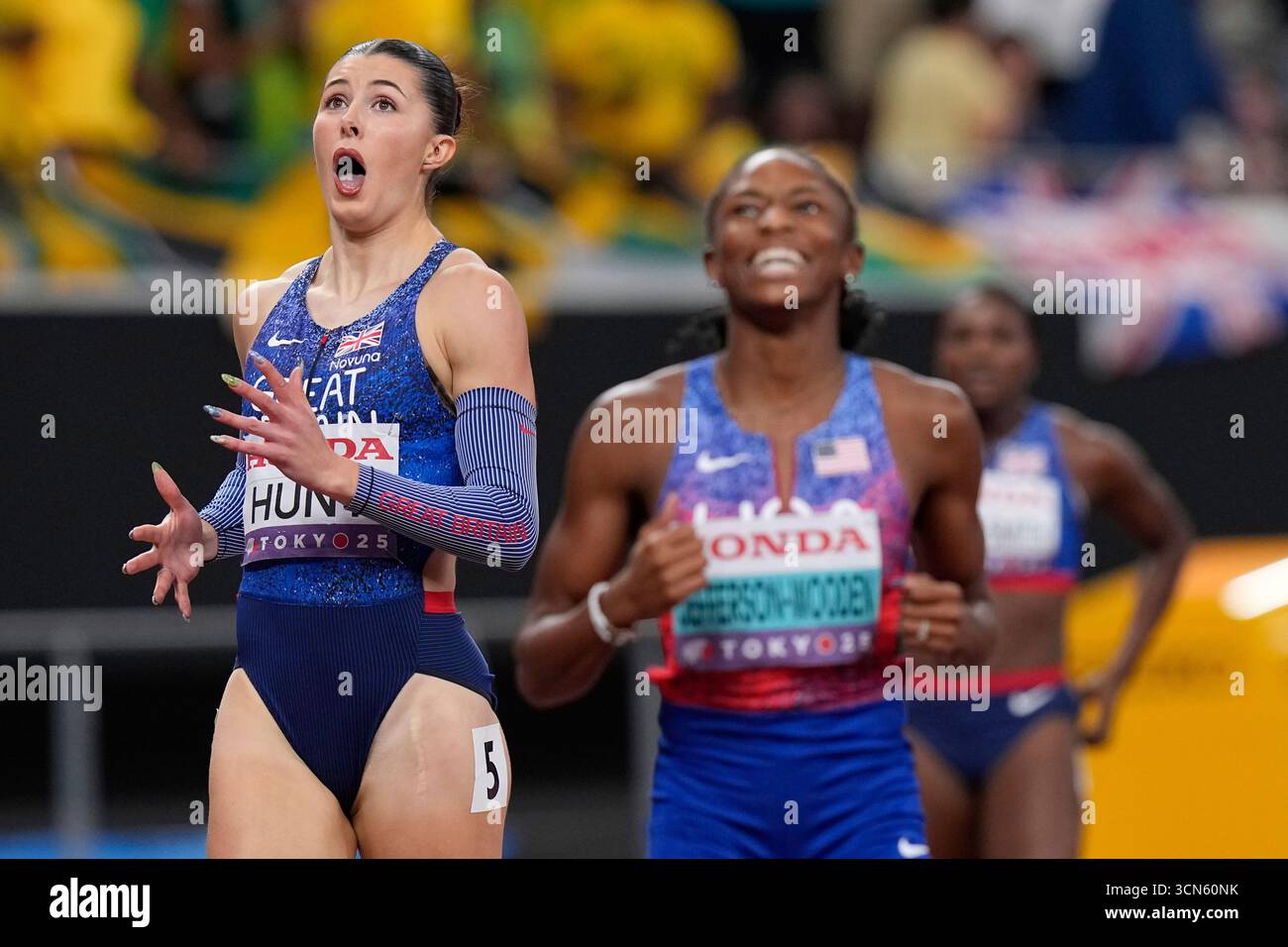 Britain's Amy Hunt, left, reacts after winning silver medal in the ...