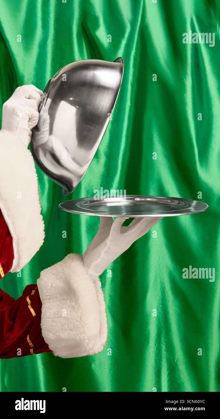 Hand lifting cloche serving hi-res stock photography and images - Alamy