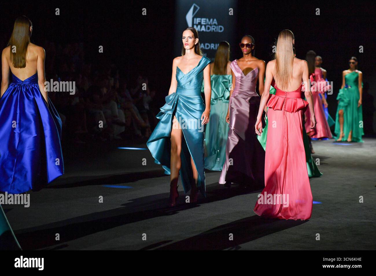 Models walk the runway wearing a design by Hannibal Laguna during ...