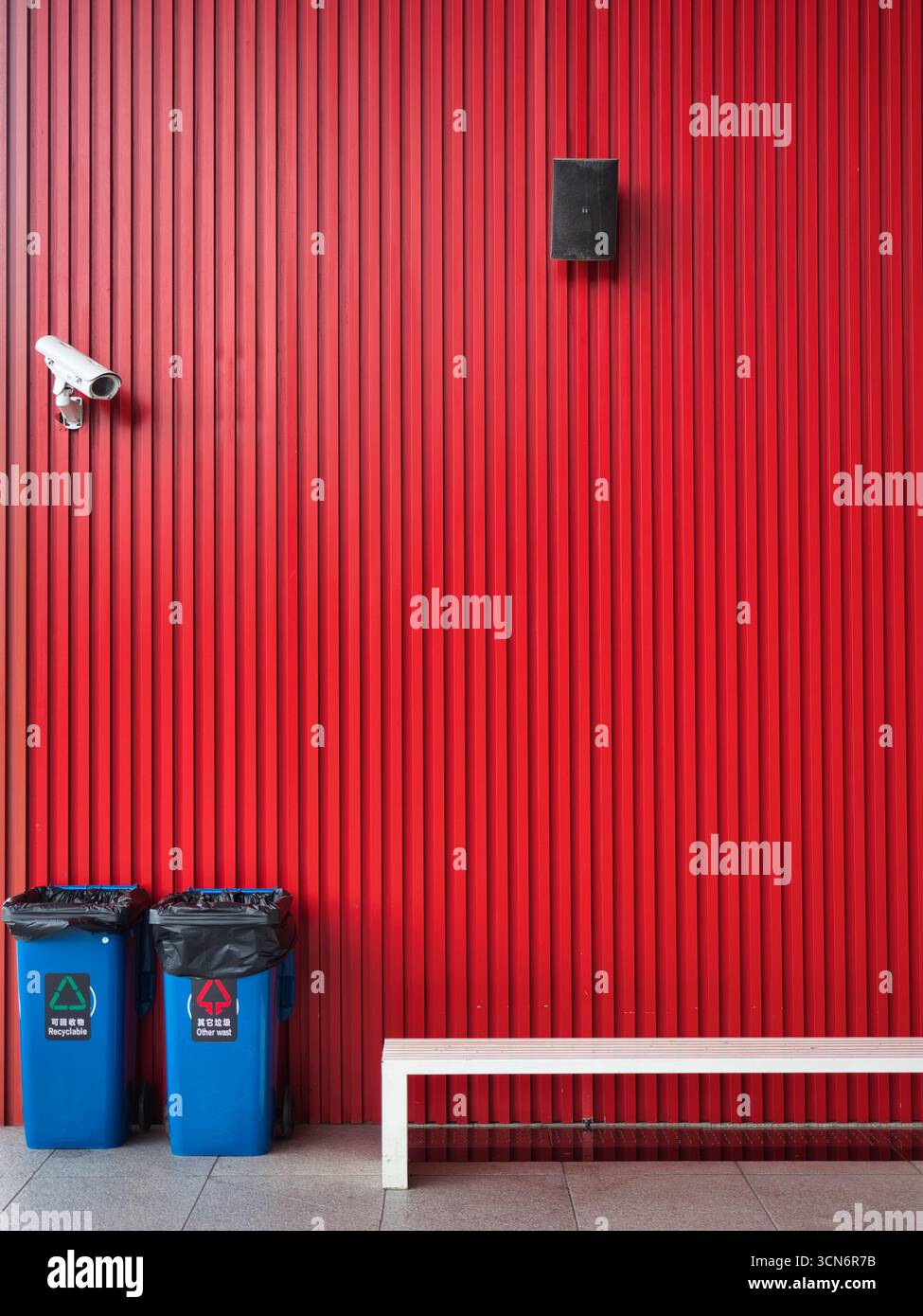 Colorful modern urban wall with security camera - A minimalist ...