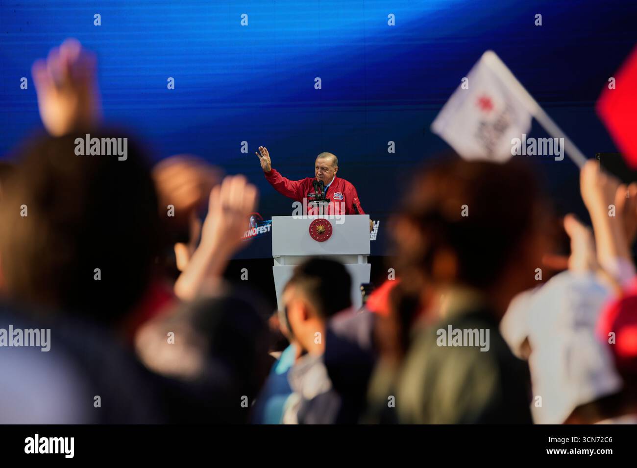 Turkey's President Recep Tayyip Erdogan gestures as he gives a speech ...