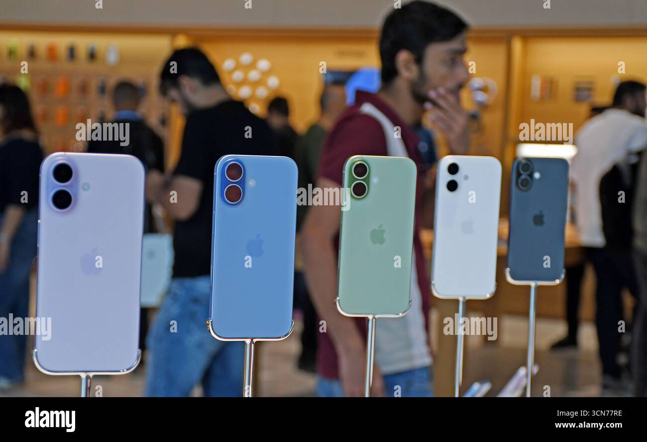 Models of iPhone 17 series mobile phones seen on display inside the ...
