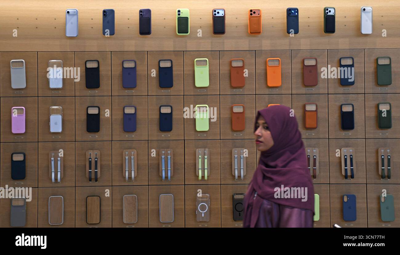 Phone covers of various iPhone mobile phone models seen displayed ...