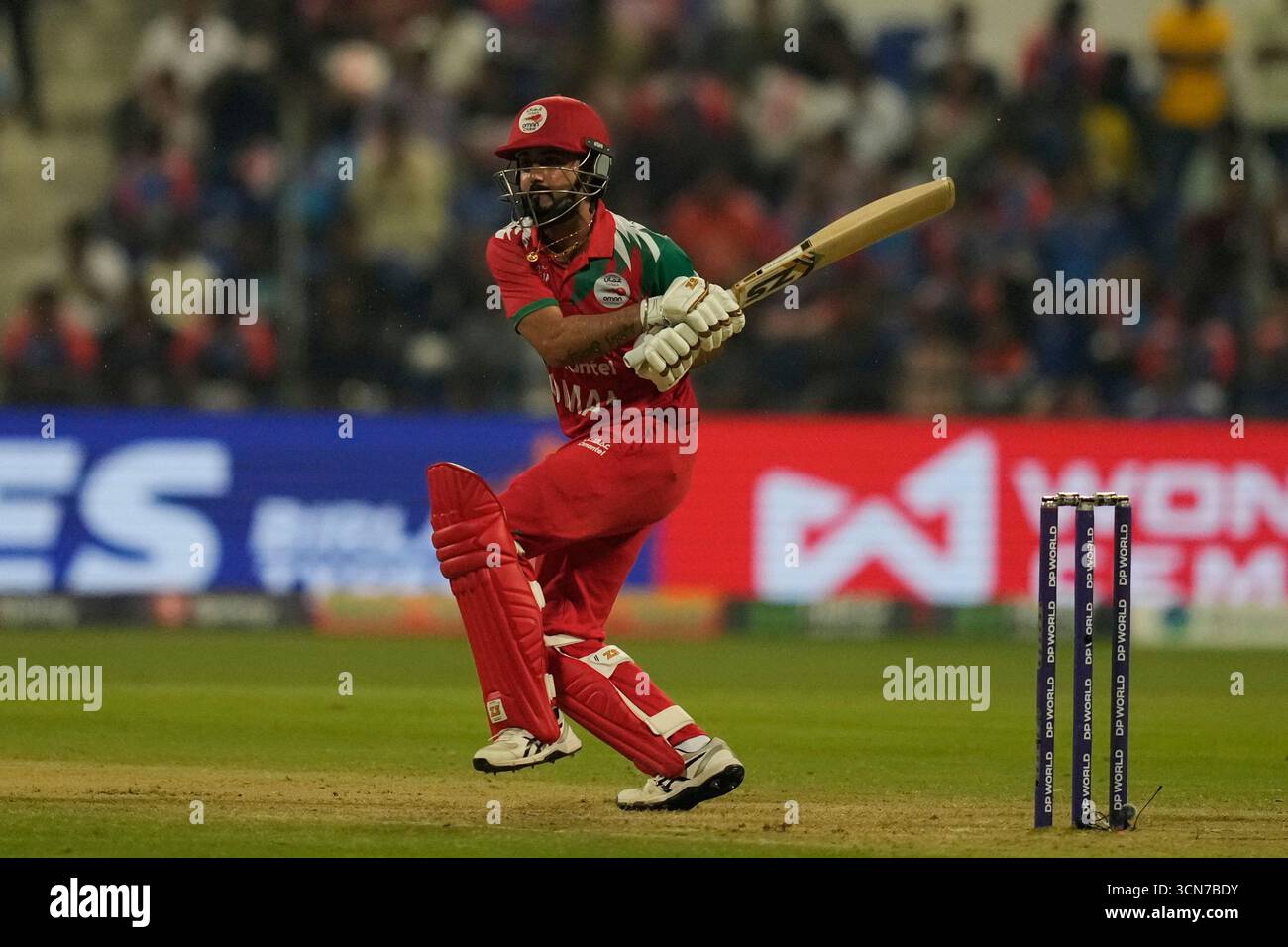 Oman's Captain Jatinder Singh plays a shot during the Asia Cup cricket match between India and ...