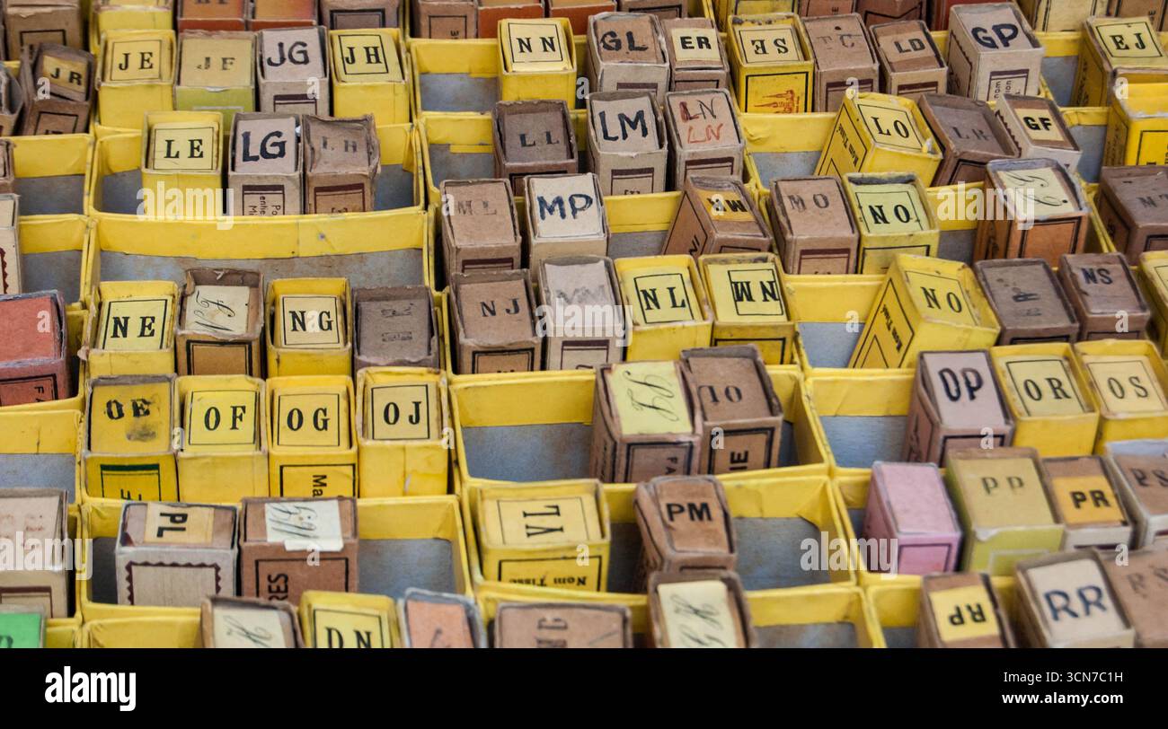 Stack of cardboard boxes with alphabet letters and syllables. Vintage ...