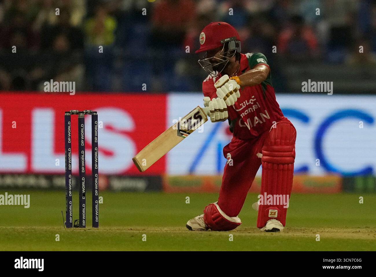 Oman's Captain Jatinder Singh plays a shot during the Asia Cup cricket match between India and ...