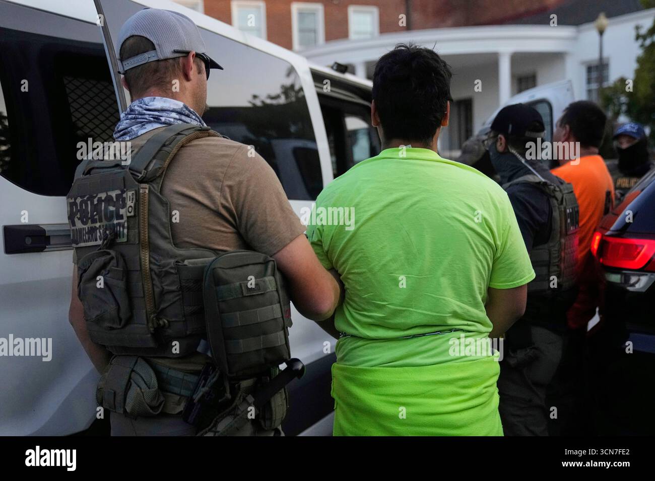 U.S. Immigration and Customs Enforcement agents make an arrest during ...