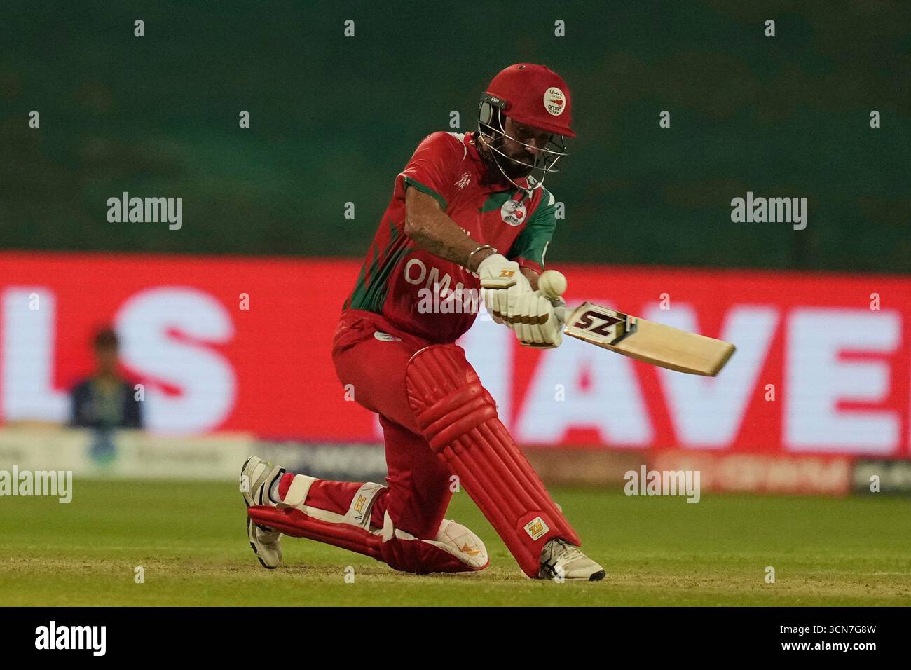 Oman's Captain Jatinder Singh plays a shot during the Asia Cup cricket match between India and ...