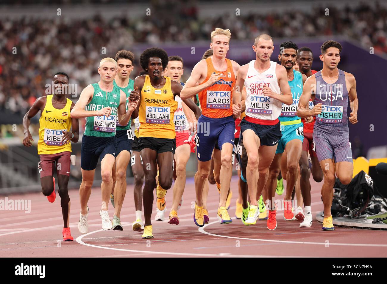 George Mills of Great Britain sets the pace in the Men's 5000 metres ...
