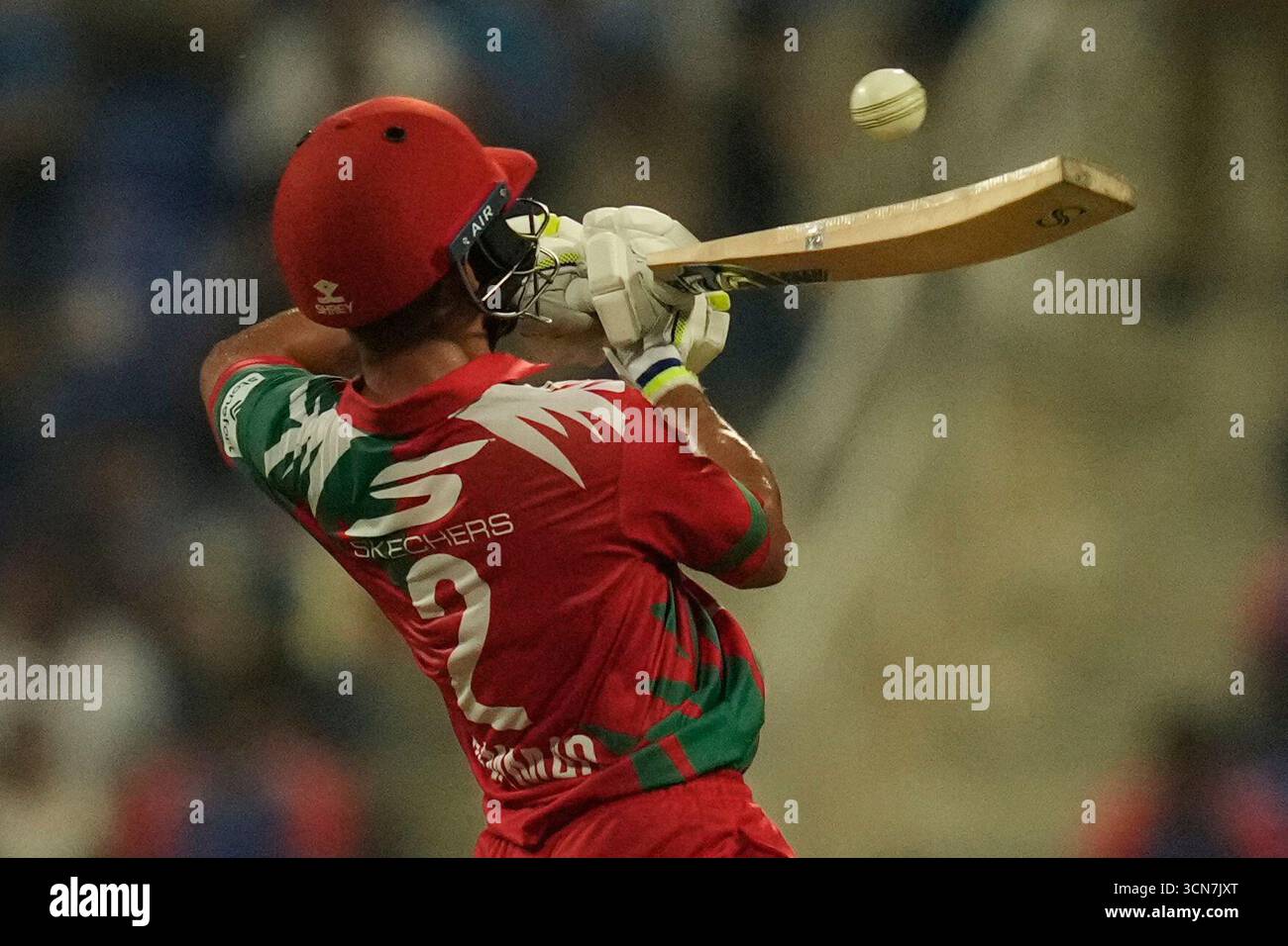 Oman's Hammad Mirza plays a shot during the Asia Cup cricket match ...