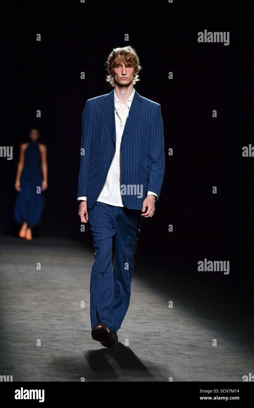 A model walks the runway wearing a design by Baro Lucas during Mercedes ...