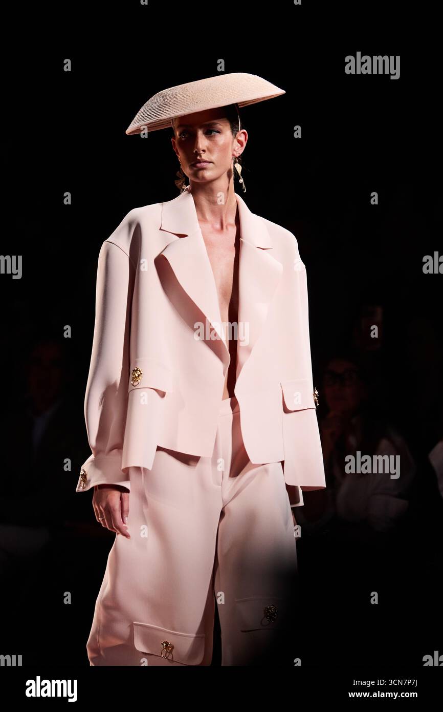 Models walk the runway wearing creations by Isabel Sanchis during the ...