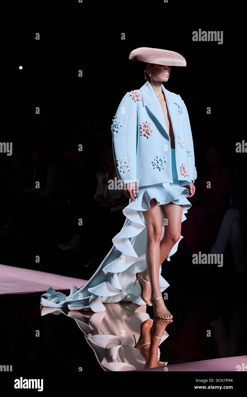 Models walk the runway wearing creations by Isabel Sanchis during the ...