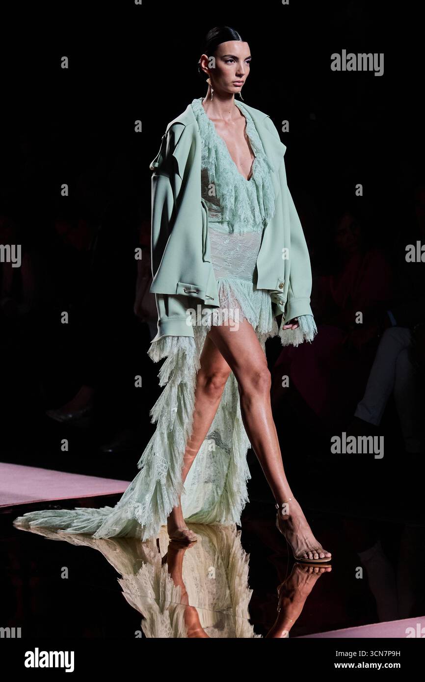 Models walk the runway wearing creations by Isabel Sanchis during the ...