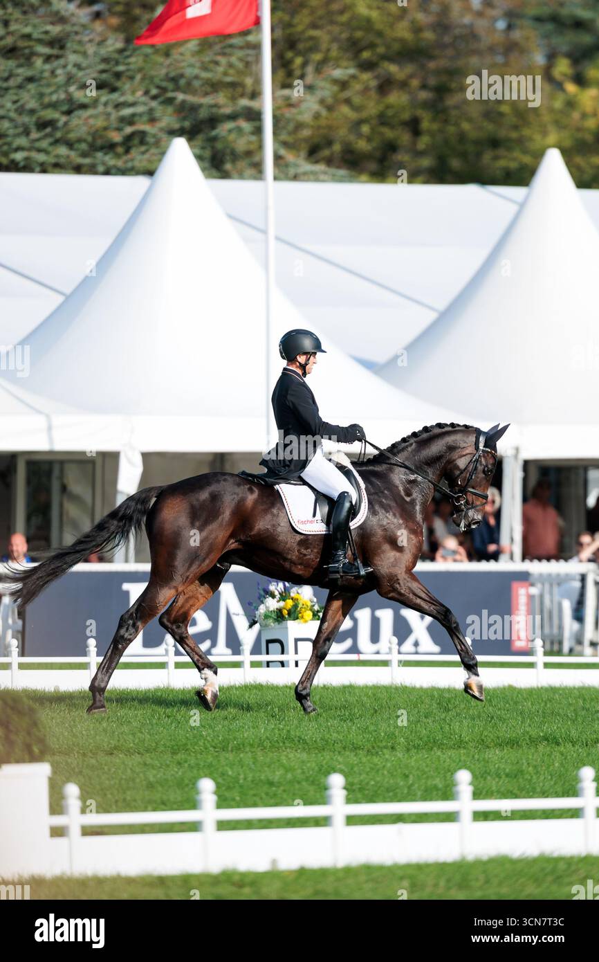 Michael Jung of Germany with Fischerchipmunk Frh during the dressage at ...