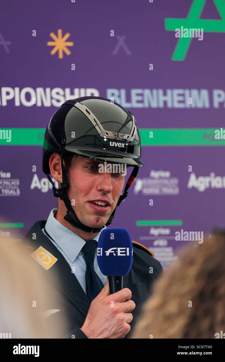 Jérôme Robiné of Germany being interviewed after the dressage test at ...