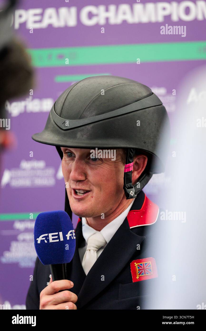 Tom Mcewen of Great Britain being interviewed after the dressage test ...