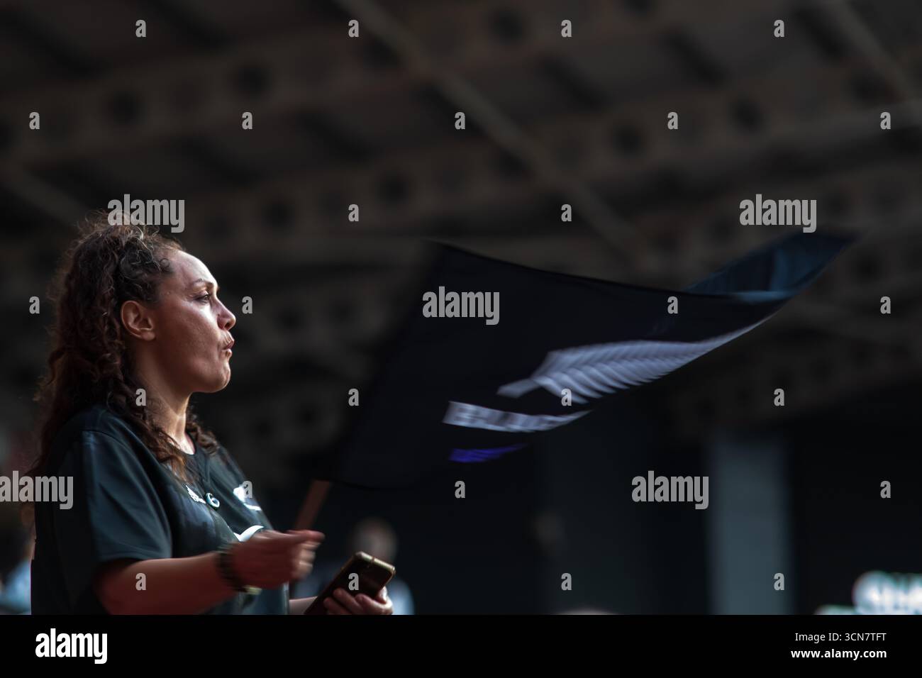 Bristol, UK, 19th September 2025 A Black Ferns fan waves a flag for her ...